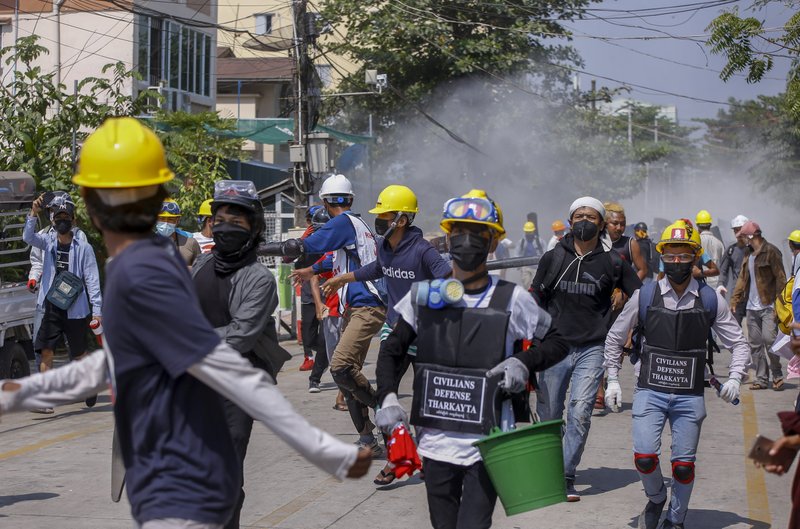Myanmar cops raid homes of rail workers