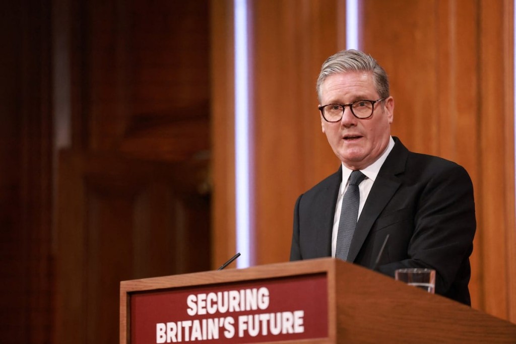 UK's Starmer, under pressure from Farage, pledges big drop in immigration