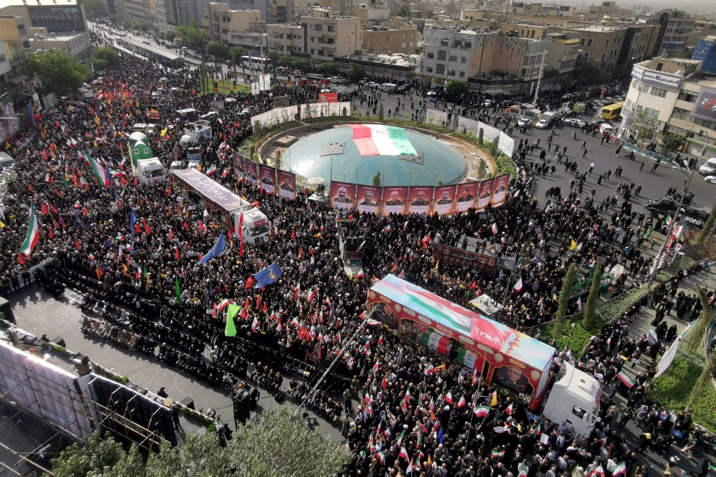 Iran holds state funeral for top brass slain in war with Israel