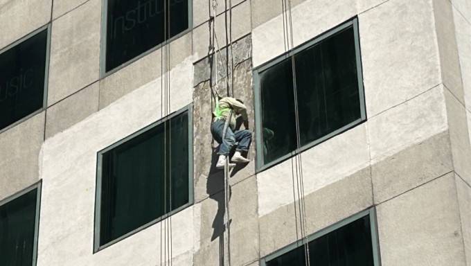 Worker left dangling off Kowloon Bay building rescued