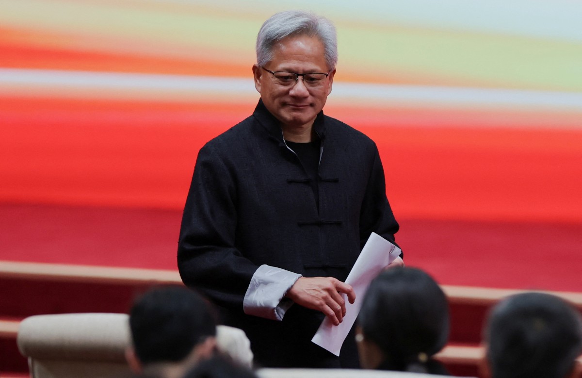 No black leather jacket! Nvidia’s Jensen Huang wears Tang suit in China