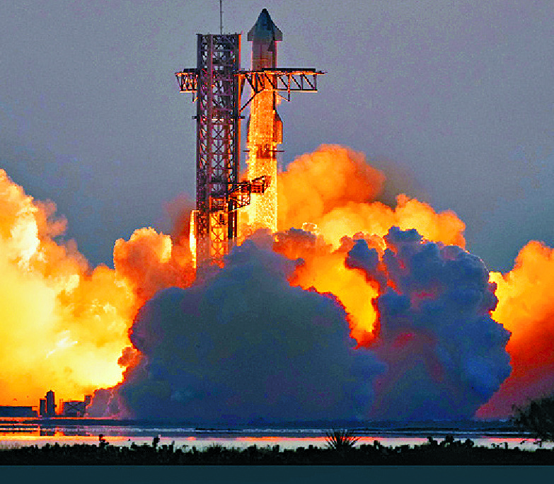 SpaceX arms catch Starship booster in 'magic chopsticks maneuver'