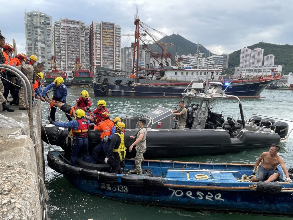 Chai Wan wave incident: Mother remains in critical condition, son ...