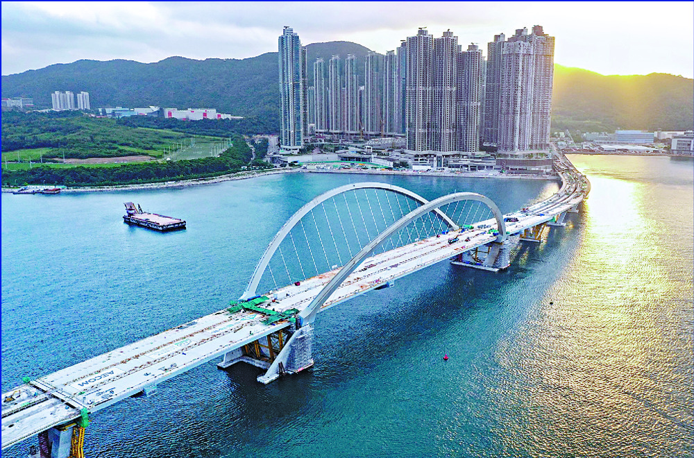 Charity walkers first to test fancy TKO bridge