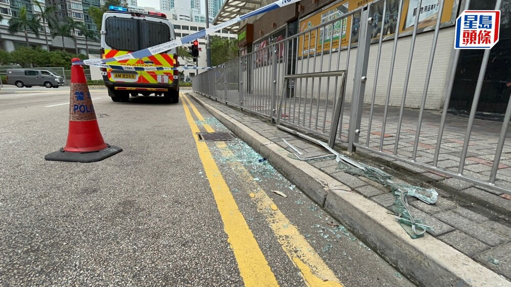 On Chak Mansion fallen window narrowly misses bus