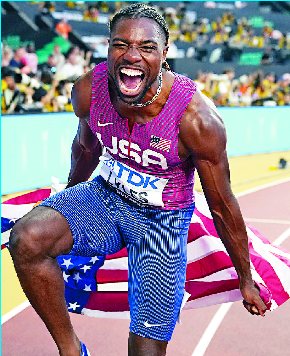 US sprinter eyes more glory after taking 100m world title