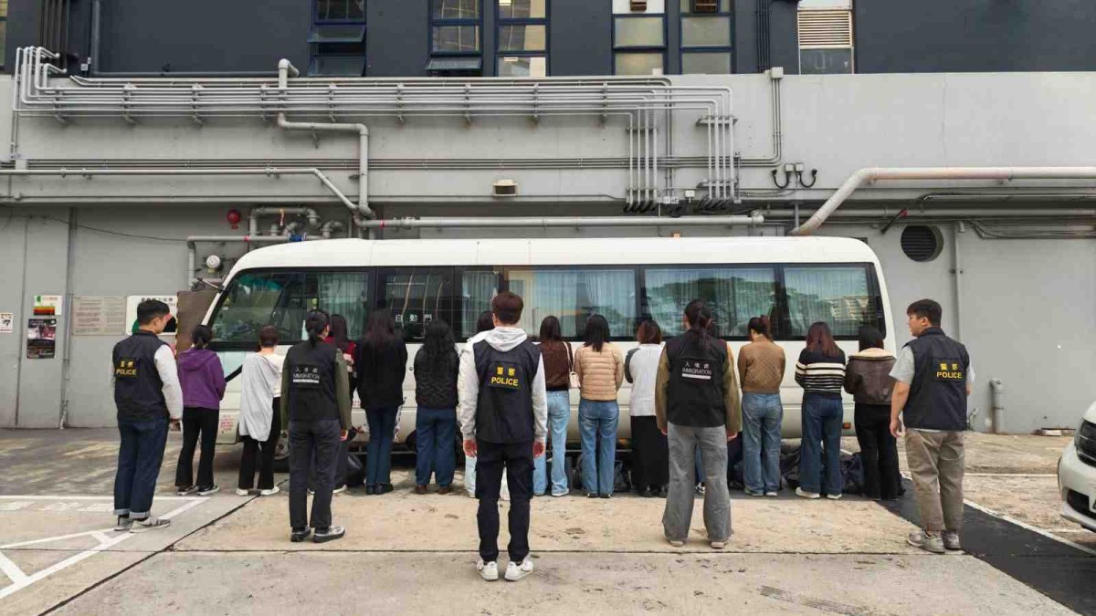 Police, ImmD arrest 17 over illegal work, fake IDs