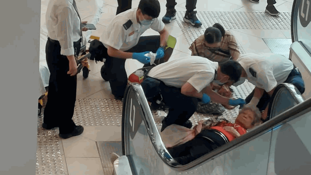 Elderly woman injured after tumbling down escalator
