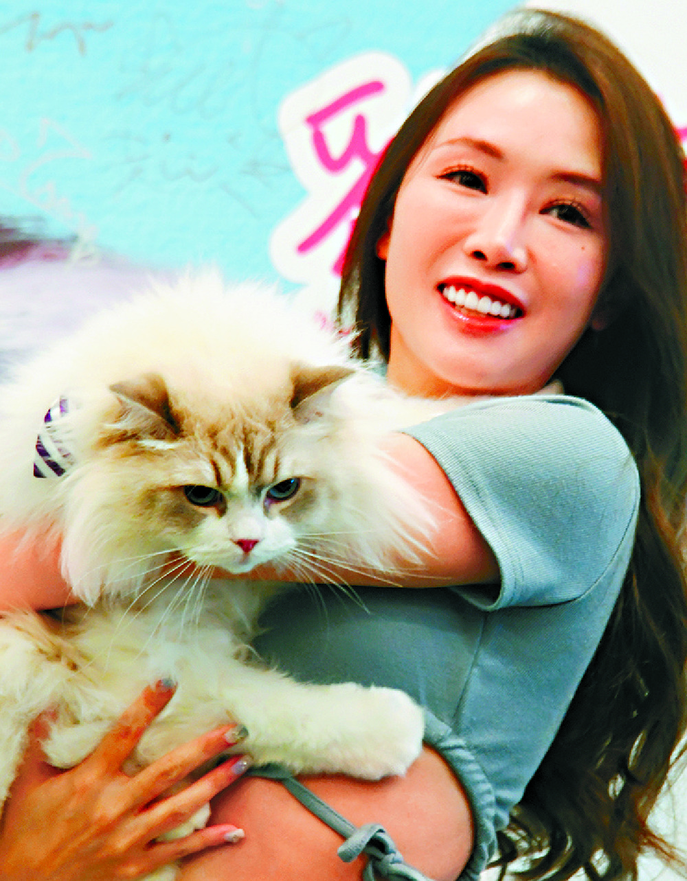 Cat boom has expo organizer purring