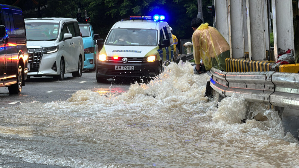 Two injured as burst flush-water pipe floods Sau Mau Ping road