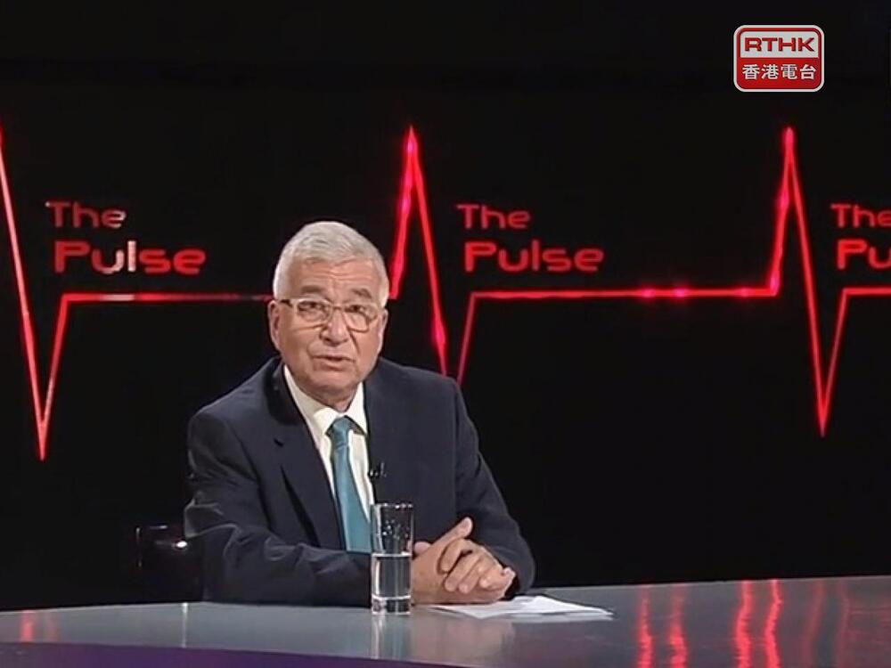 Veteran journalist Steve Vines says he has fled to Britain