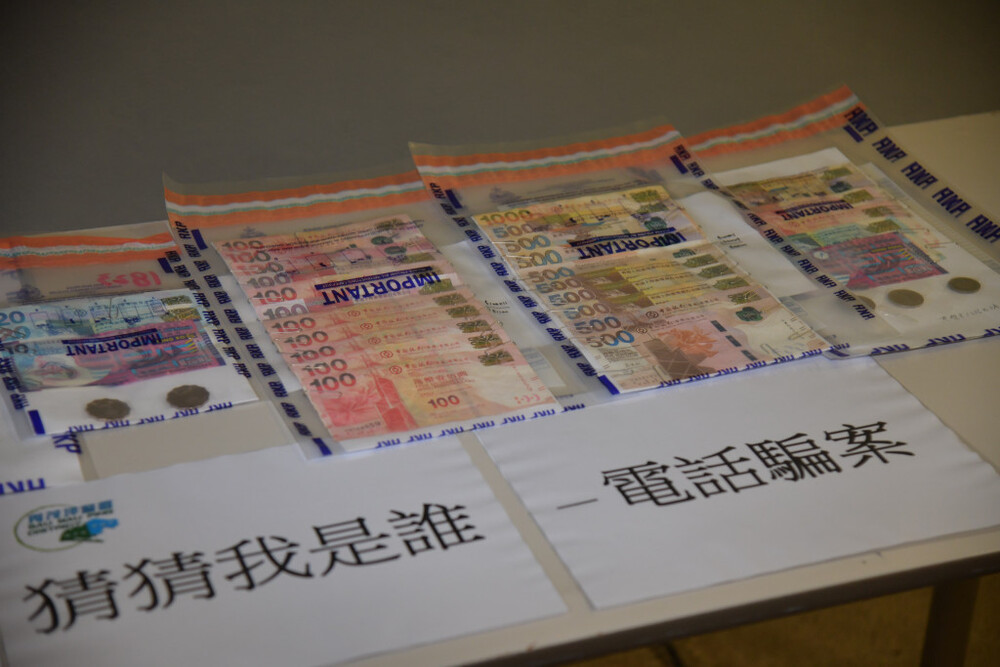Three triad members arrested for cheating HK$210,000 in 'Guess Who' scams