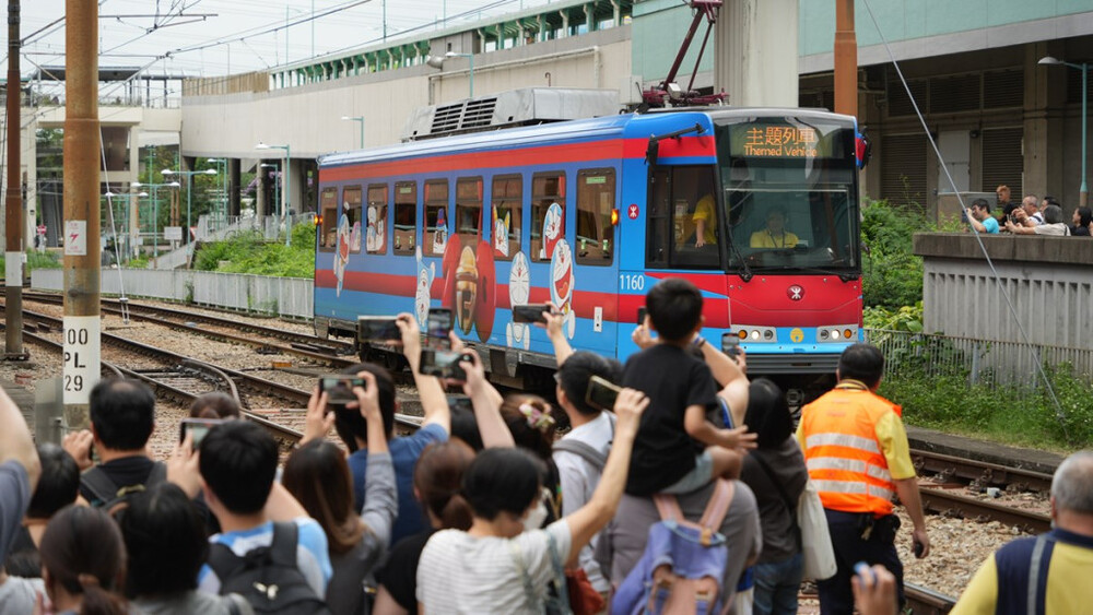 Trains painted with ever-popular Doraemon travel through three lines