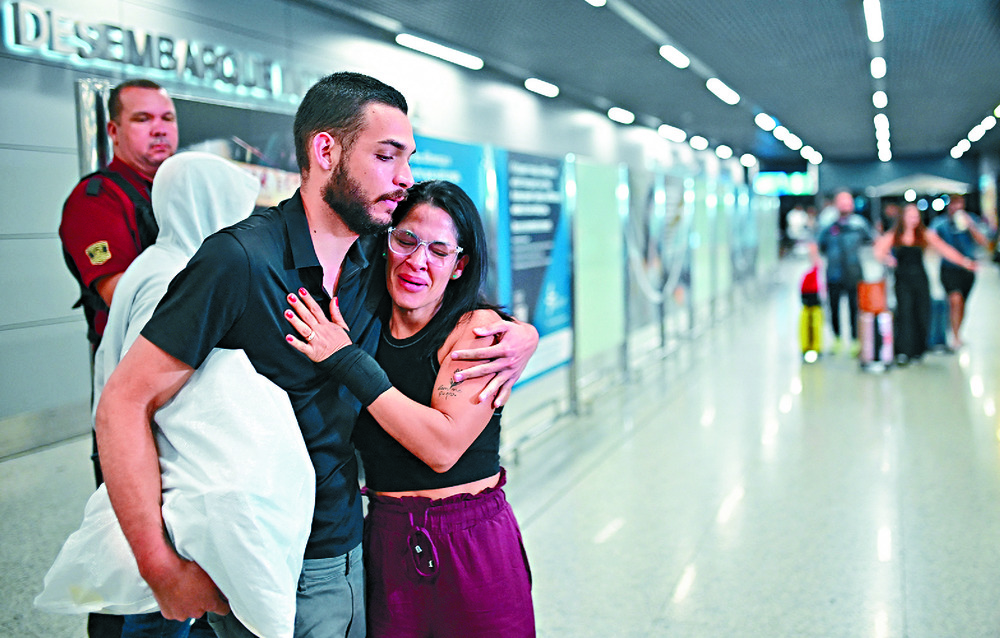 Gaza 'clean out' floated as Brazilians deported in handcuffs