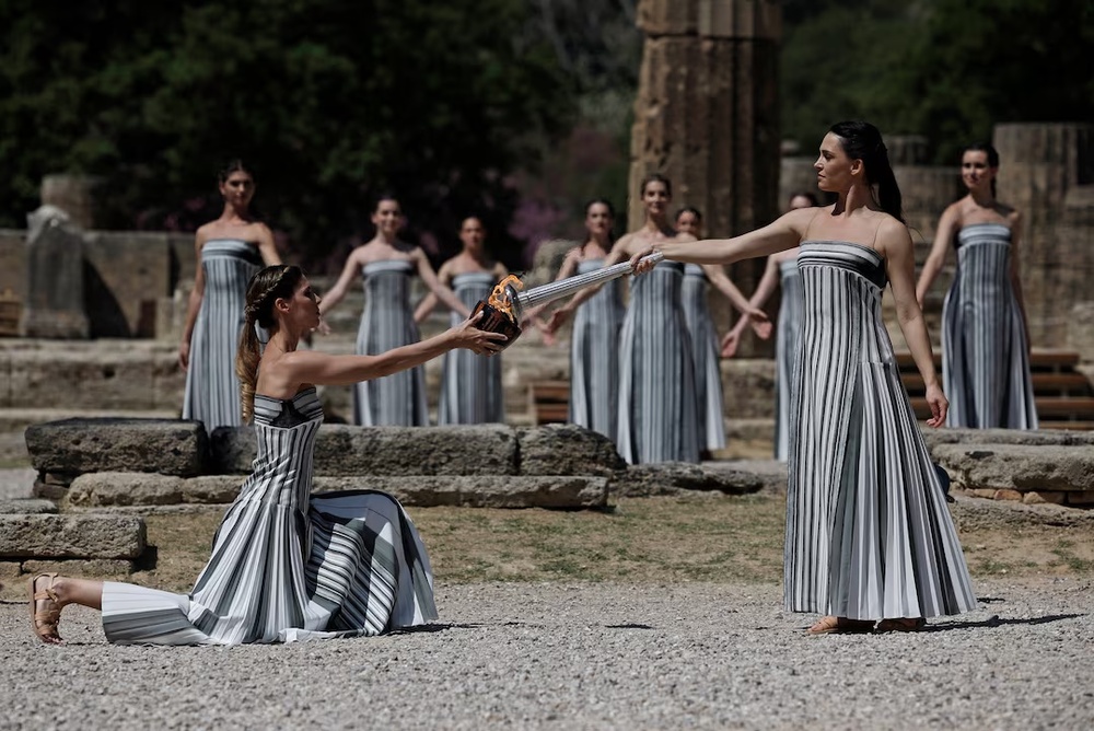 Torch and sandals: What to know about the flame-lighting ceremony in ...