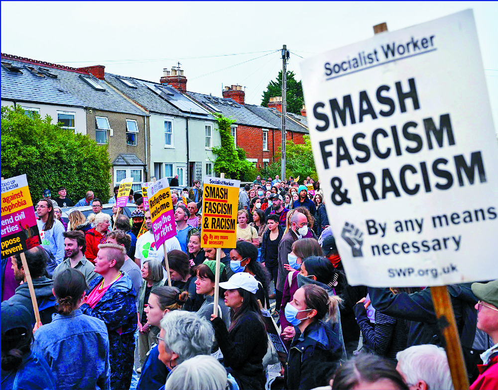 Anti-racism protesters in unity display