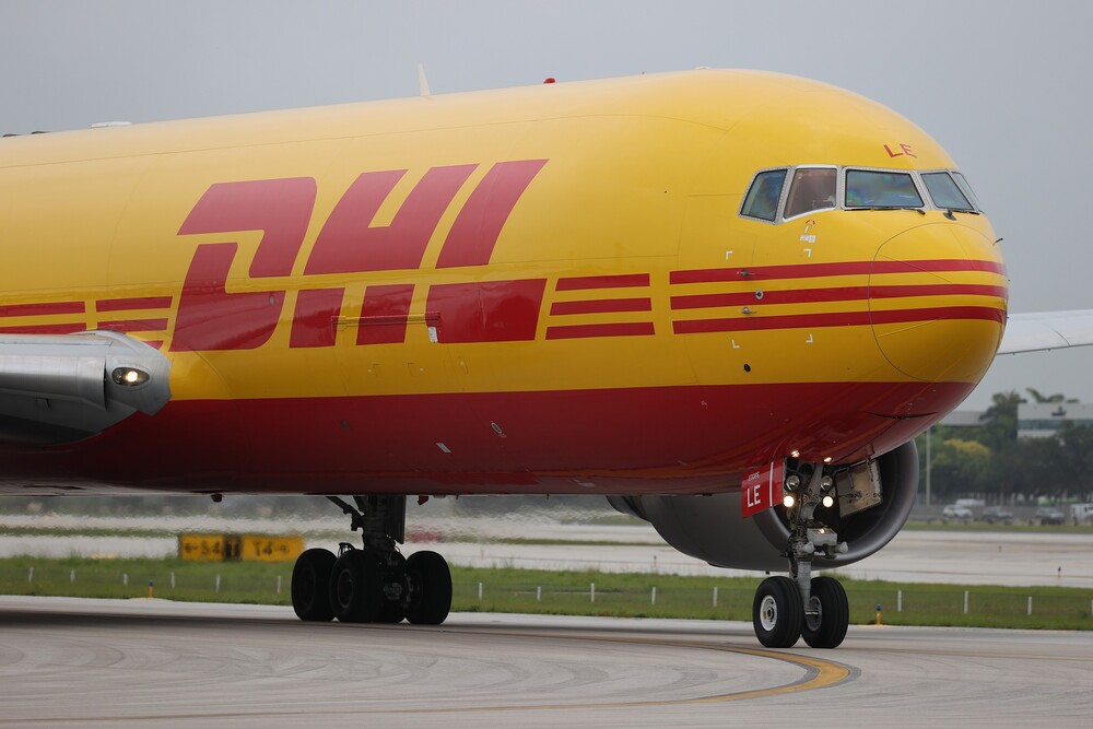 DHL to save €1.1 billion by 2027 with 8,000 job cuts, shares rise