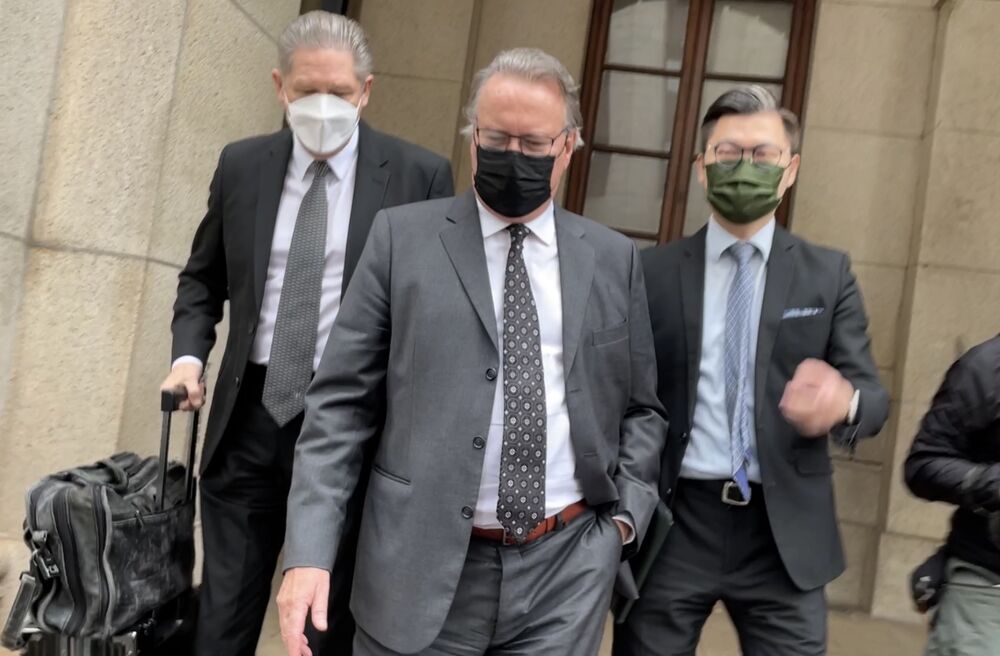 British lawyer Tim Owen arrives in Hong Kong for a case unrelated to ...