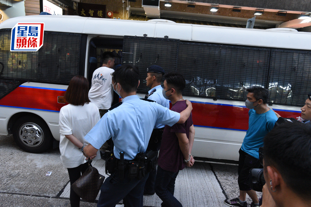 Eighteen arrested as fake police raid reveals gambling den in Sham Shui Po