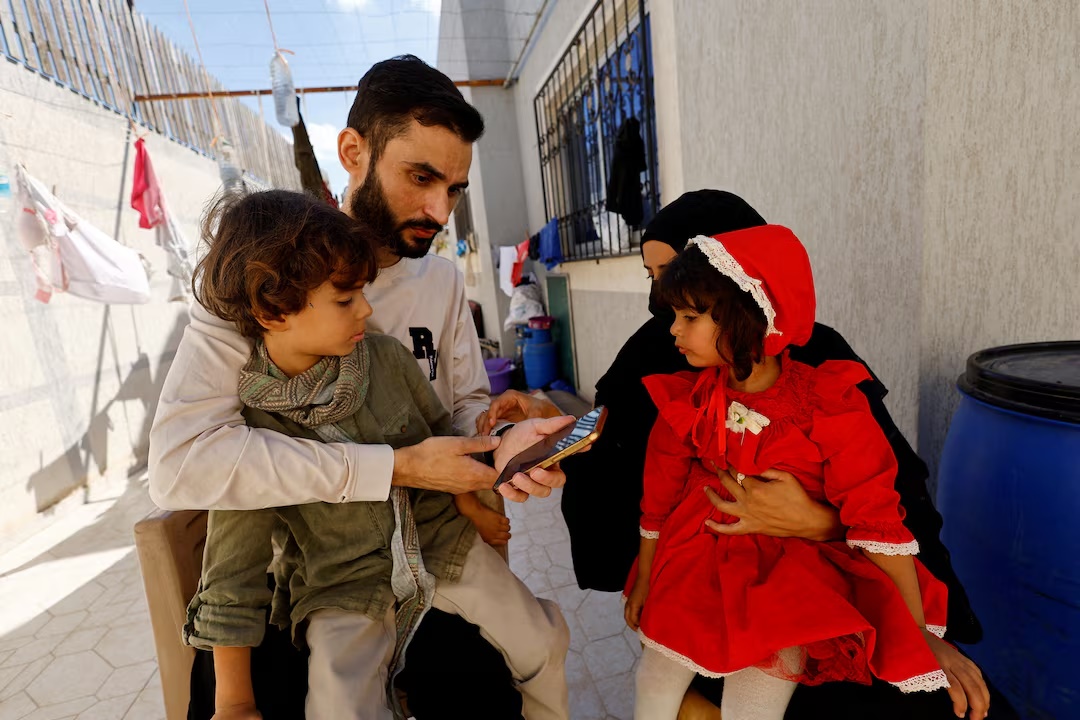 Gaza man reunited with family after being told in Israeli jail they ...