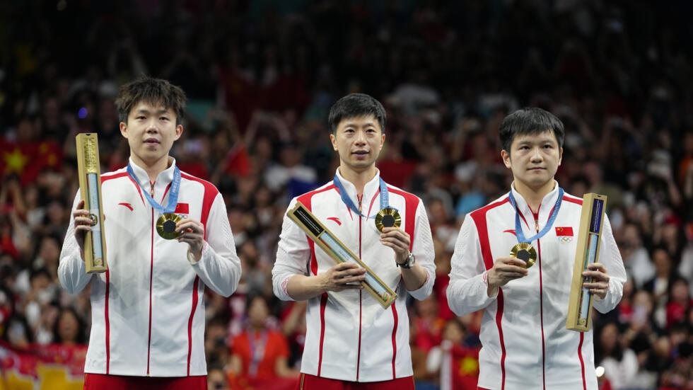 Chinese fans, state media bask in golden glow of Olympic success