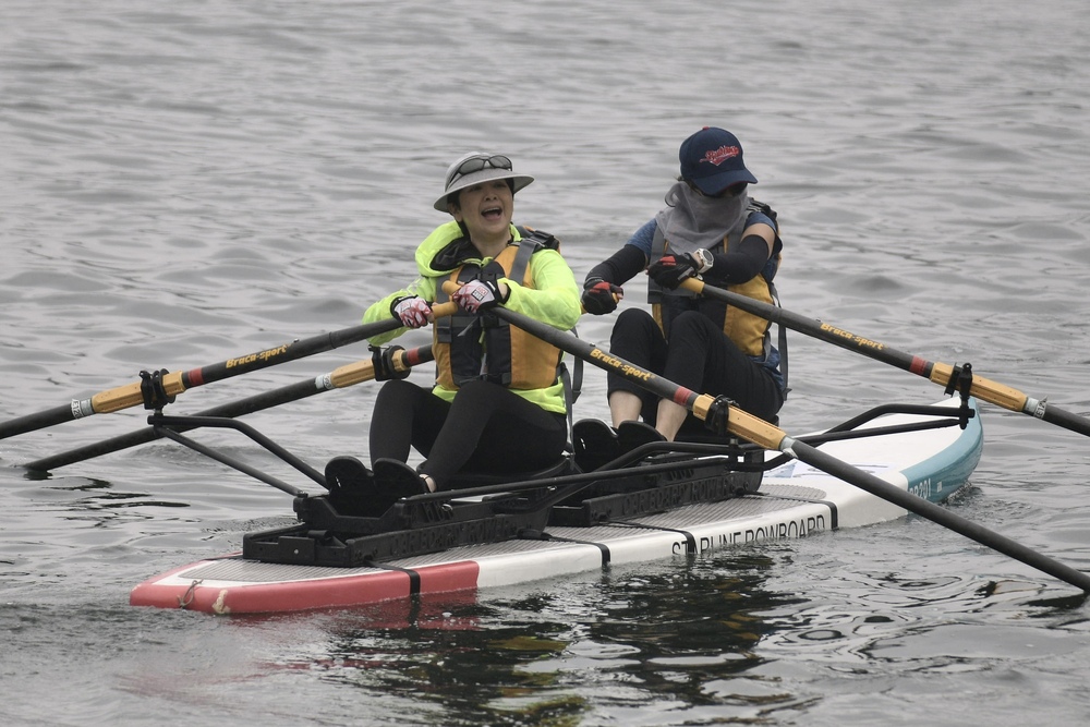 Housing chief home and dry in rowing race