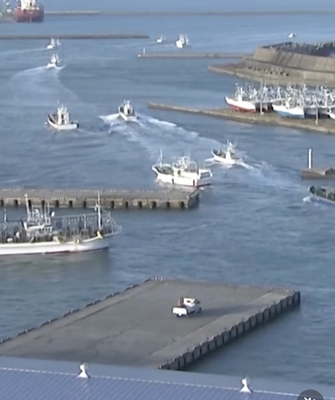 Fishing boats flee Hokkaido harbour after 7.7-magnitude quake triggers ...