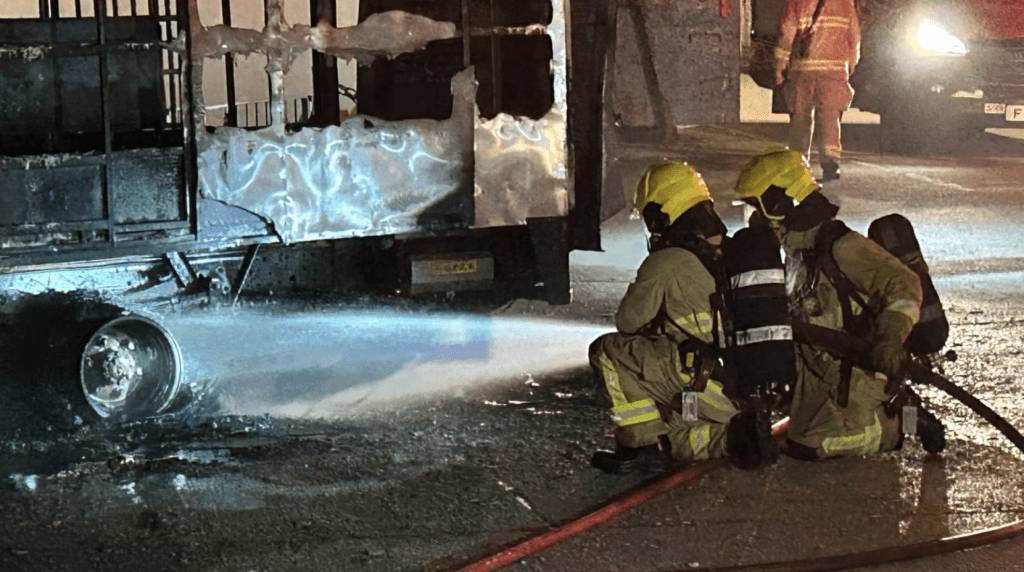 Truck destroyed by fire under Kowloon Bay bridge, cause deemed suspicious