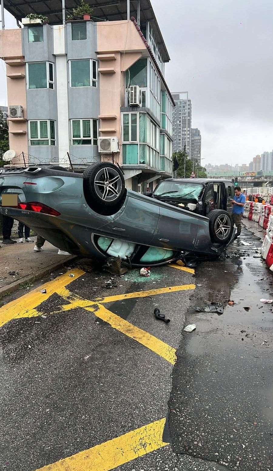 Head-on crash in Yuen Long sees Mercedes overturned, probe into ...