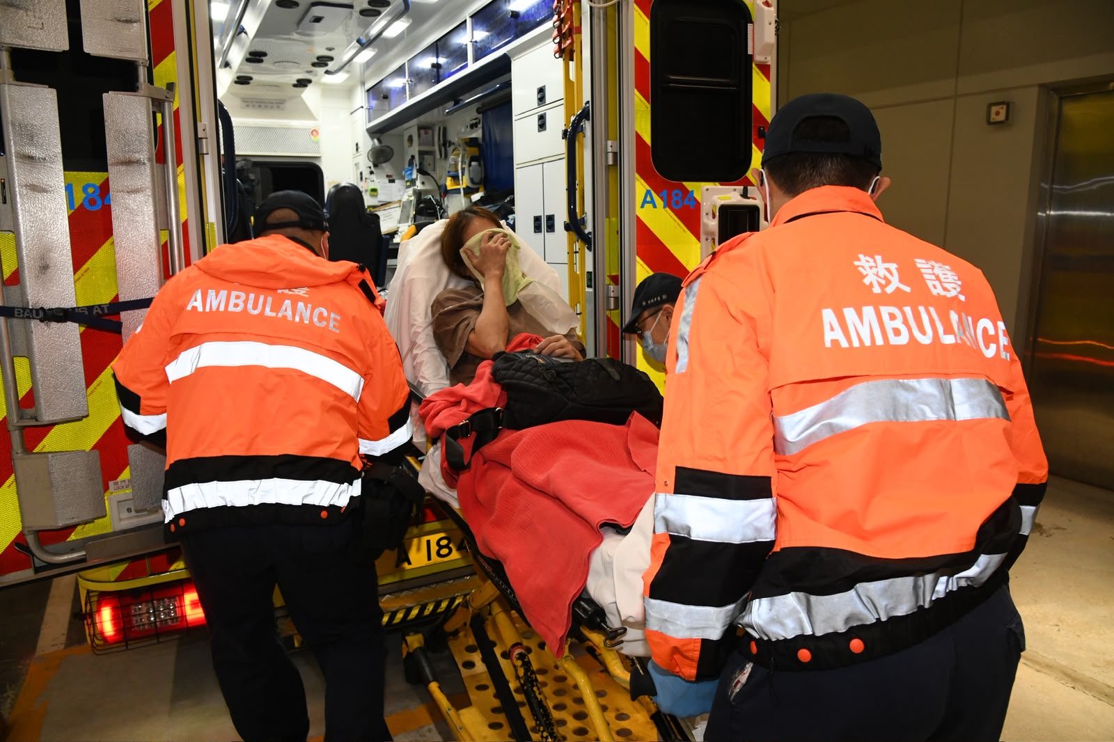 Electric unicycle fire in Tuen Mun estate injures two, 80 evacuated