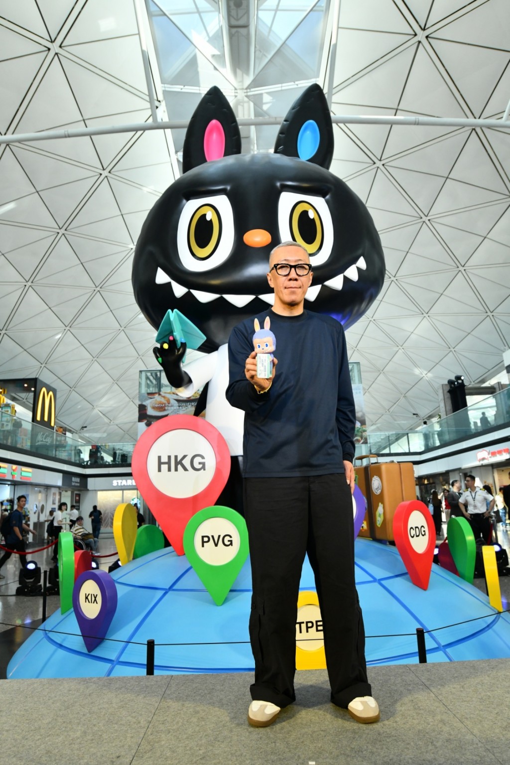 Giant greetings: The 7m Labubu welcomes travelers at HK Airport