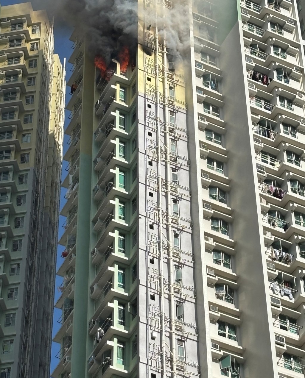 Nearly 100 evacuated after flames erupt in Kai Ching Estate, no injuries