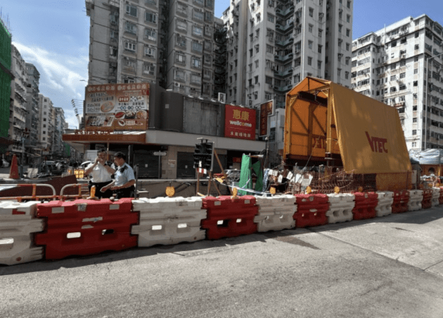 Worker dies after being struck by falling hoist at Sham Shui Po ...